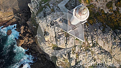 Aerial View of a Lighthouse on the Edge of a Cliff Stock Footage ...