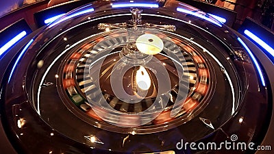 Aerial View of Roulette Wheel Spinning Under Glass Sphere with ...