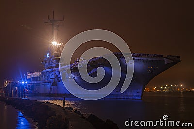 Aircraft Carrier At Night Stock Photo - Image: 54868134