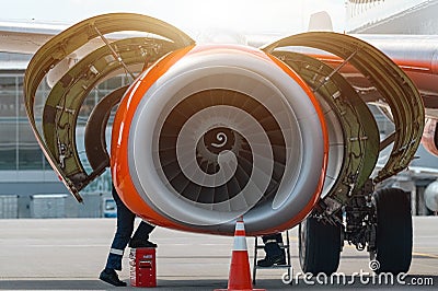 Aircraft Maintenance Mechanics Inspecting And Working On Airplane Jet ...