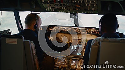 Airplane Captain and Copilot Looking at Radar Compass on Dashboard ...