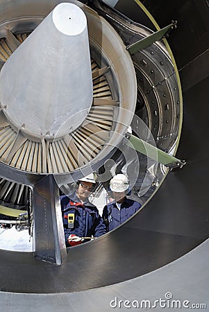 Airplane Mechanics Inside Large Jet-engine Stock Photography - Image ...