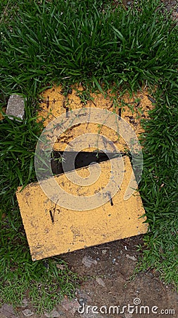 The Ajar Yellow Manhole Cover Stock Photography | CartoonDealer.com ...