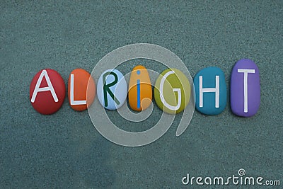 Alright Word Composed With Multi Colored Stone Letters Over Green Sand ...