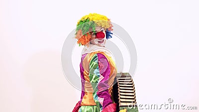 Amusing Funny Clown Playing The Harmonica, Singing And Dancing At The ...