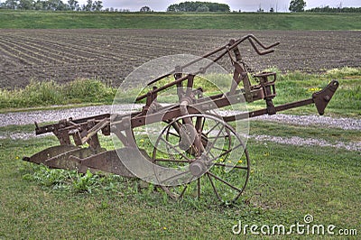 Ancient Plough On The Grass Royalty Free Stock Photo - Image: 14720305