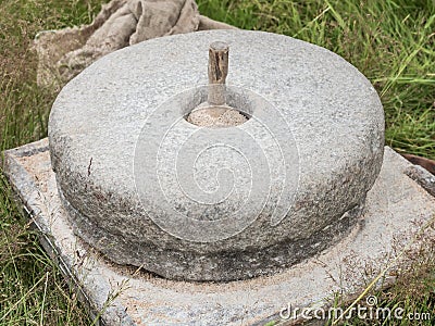 The Ancient Stone Hand Mill With Grain Stock Photo - Image: 74932708
