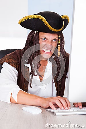 Angry Pirate Using Computer Royalty-Free Stock Photo | CartoonDealer ...