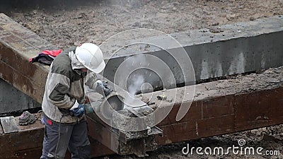 Angular Saw Grinding through Construction Piles at Construction Site ...