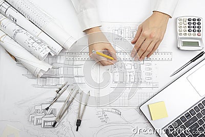 Architect Working On Blueprint. Architects Workplace - Architectural ...
