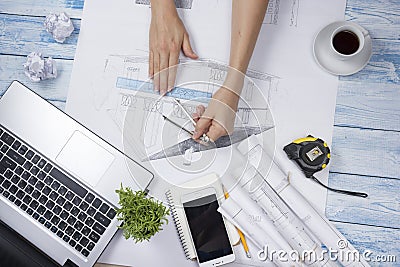 Architect Working On Blueprint. Architects Workplace - Architectural ...