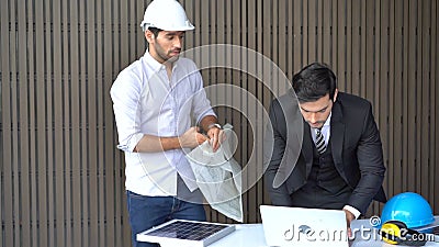 Architects Working on Plans. Business People and Construction Engineers ...