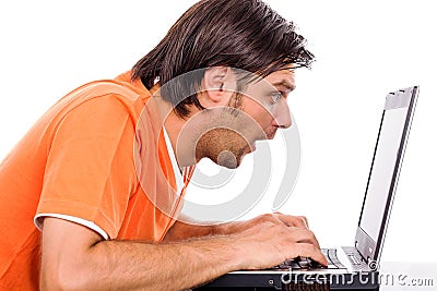 Astonished Young Man Staring At His Laptop Stock Photo | CartoonDealer ...