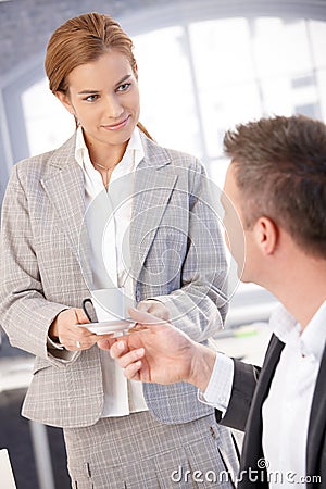Attractive Secretary Handing Coffee To Boss Royalty Free Stock Photo ...