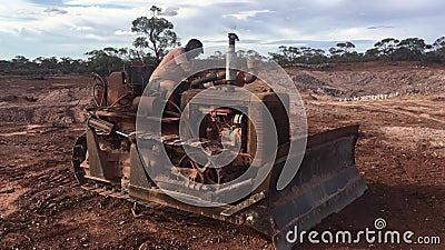 Australian Man Driving on an Old Tractor in the Outback of Western ...