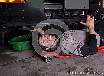 Auto Mechanic Oil Change Stock Image - Image: 18073851