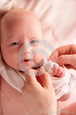 Baby Getting Dressed Stock Photo - Image: 15538960