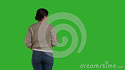 Back View of Model Being Displeased and Pushing Something Sideways ...