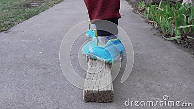 Balance Exercise - Feet of a Man Walking Back and Forth on a Wobbly 2x4 ...