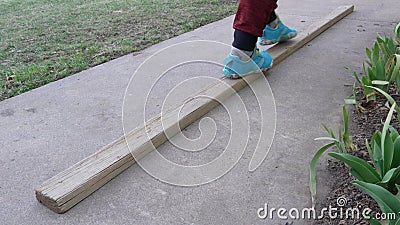 Balance Exercise - Feet of a Man Walking Back and Forth on a Wobbly 2x4 ...