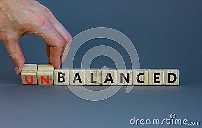 Balanced Or Unbalanced Symbol. Businessman Turns Cubes, Changes Words ...