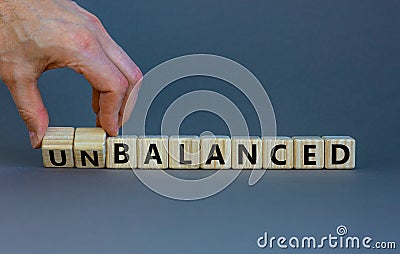 Balanced Or Unbalanced Symbol. Businessman Turns Cubes, Changes Words ...