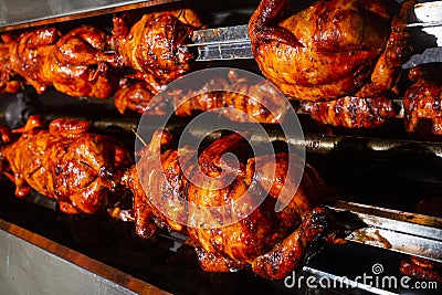 Barbecue Roast Chicken In A Row Turning At Industrial Roaster Royalty ...