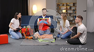 Basic Emergency Training in Group, Man Showing Artificial Lung ...