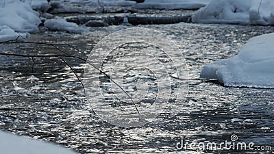 A Beautiful Crystal Clear Stream in Winter with Snow Flows through ...