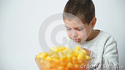 Beautiful Preschool Boy Eating Delicious Crispy Corn Chips on a White ...