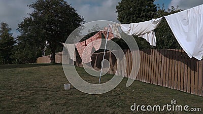 Bed Sheets Drying Outside In The Wind Stock Footage - Video of ...
