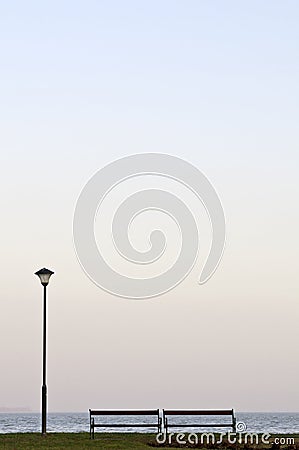 Bench And Lamp Post At Lakeside Vertical Royalty-Free Stock Image ...