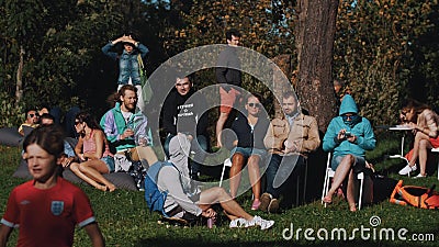 Big Group of Young People Chilling Out Outside on a Sunny but Also ...