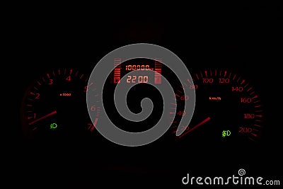Black Automobile Dashboard With Orange Lights Of Odometer And Green ...