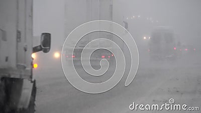 Blizzard on the Road and Low Visibility. Bad Weather in the City Stock ...