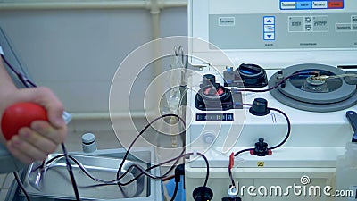 Blood Transfusion Equipment Works on a Patient, Pumping Blood. Stock ...