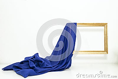 Blue Fabric Curtains Unveiling A Levitating Golden Empty Frame, On ...