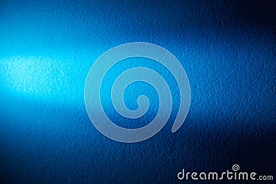 On The Blue Textural Background A Narrow Light Turquoise Ray Of Light ...