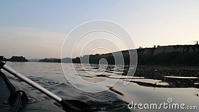 Boat Sails Along the River, Oar of Boat Touching Water and Causing ...