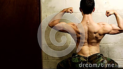 Bodybuilder Flexing Back stock footage. Video of exercise - 76295916