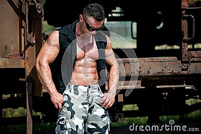 Bodybuilder Smoking A Cigar Royalty Free Stock Photo - Image: 34973595