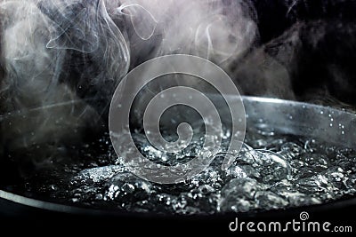 Boiling Pot Of Water With Steam Stock Photo - Image: 67065143