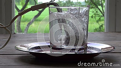 Boiling Water with Vintage Heating Coil Tool Stock Footage - Video of ...