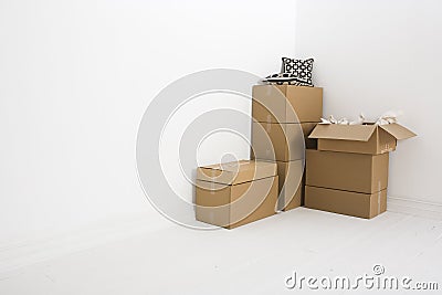Boxes Piled High In Corner Stock Images - Image: 5077854