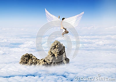 Boy With Angel Wings Flying Around In The Sky Stock Photo - Image: 50094263