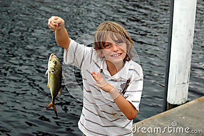 Boy Catches Fish Stock Photo - Image: 1198470