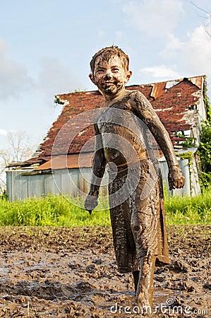Boy Covered In Mud Stock Photo - Image: 65329894