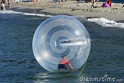 Boy In Floating Ball Stock Images - Image: 5853434