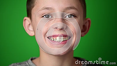 The Boy on a Green Background Puts on a Plate for Alignment of Front ...