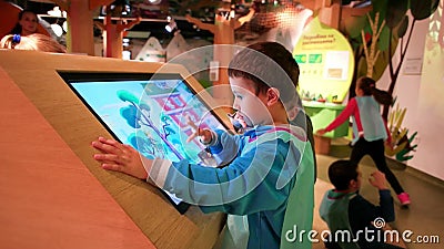 Boy Playing Computer Game, Children Move Their Fingers Along Large ...
